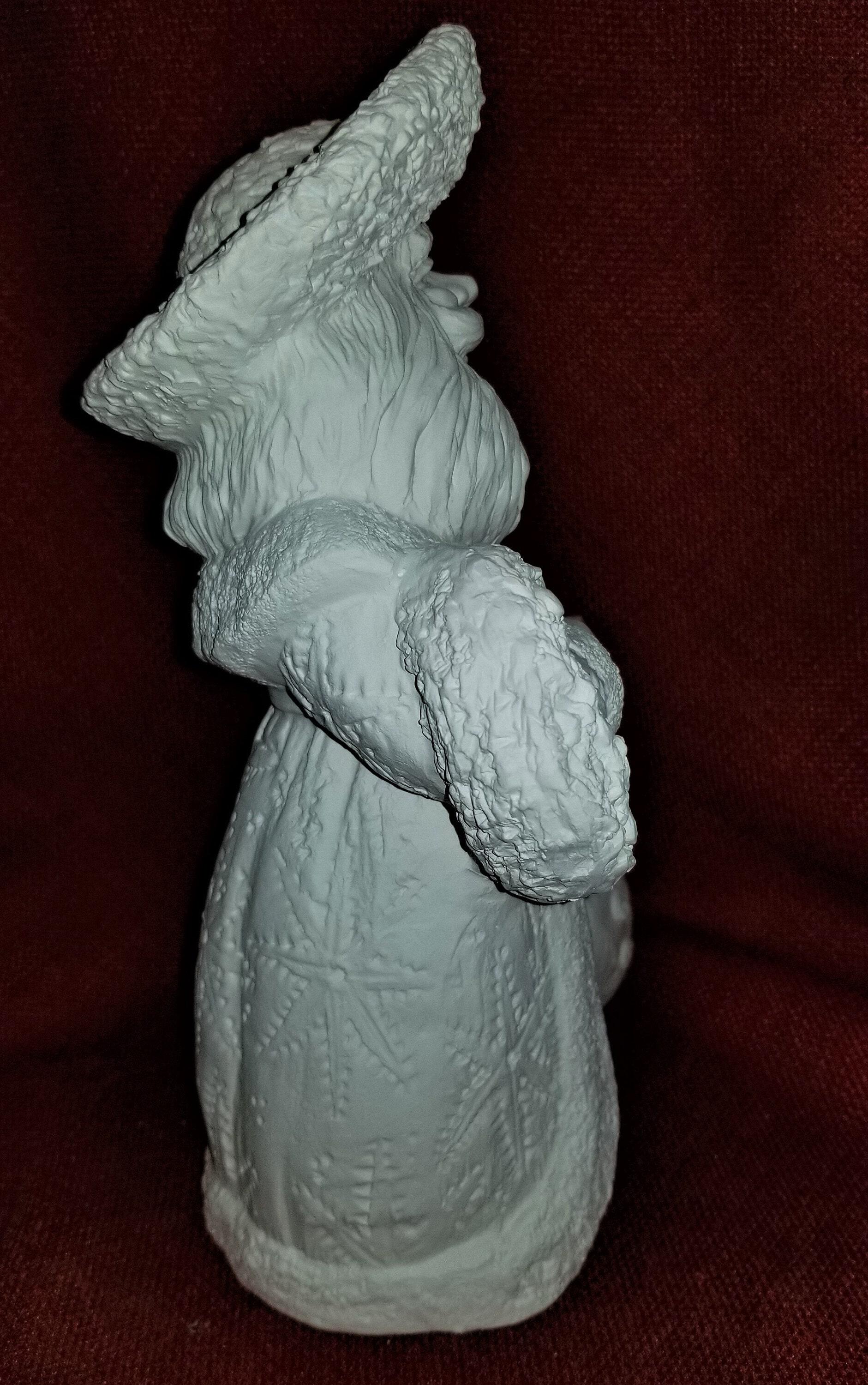 Products :: Unpainted Ceramic Renaissance Santa with Snowman at his ...